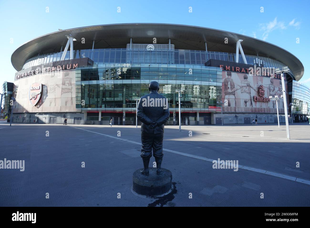 A statue of former Arsenal manager Herbert Chapman at Emirates Stadium ...