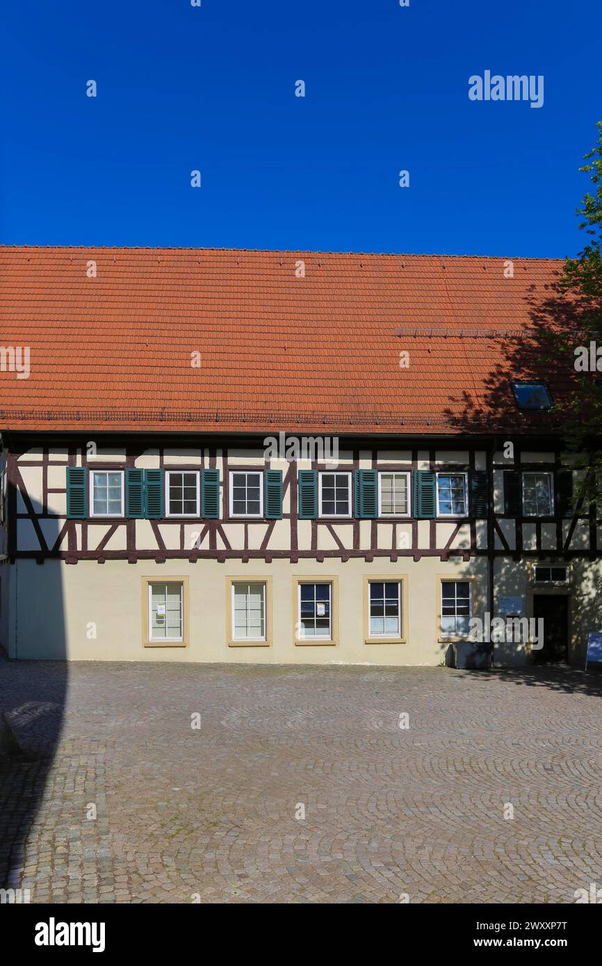 Building ensemble Muensingen Castle, today's vehicle registration ...