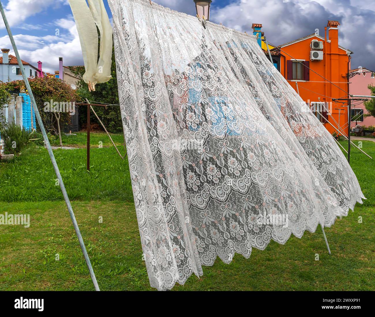 Typical Burano lace embroidery on the washing line, Burano, Venice ...