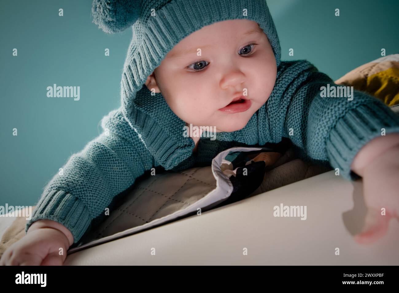 Hanging off the bed hi-res stock photography and images - Alamy