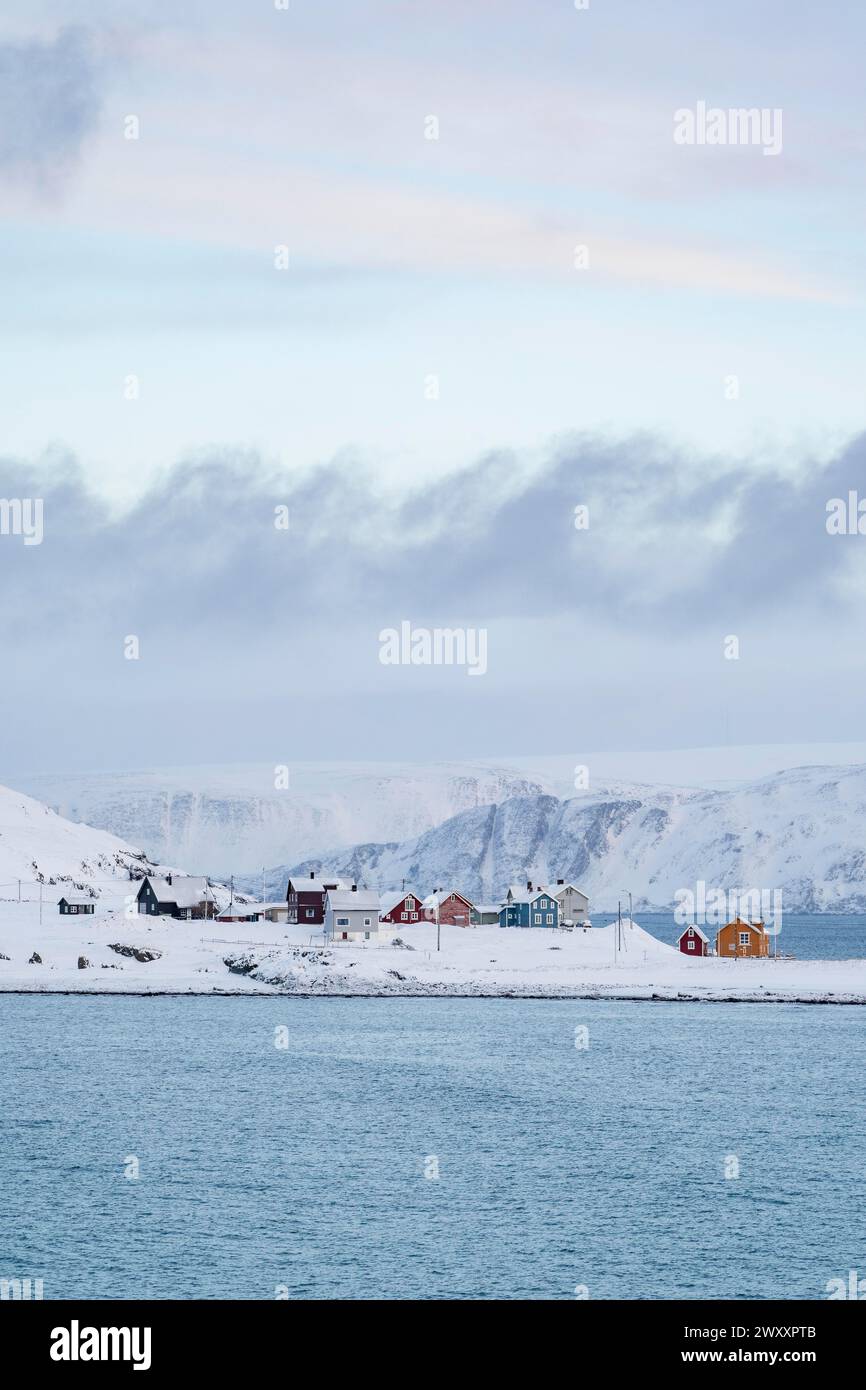 Colourful houses in a snowy landscape, fishing village Kongsfjord ...