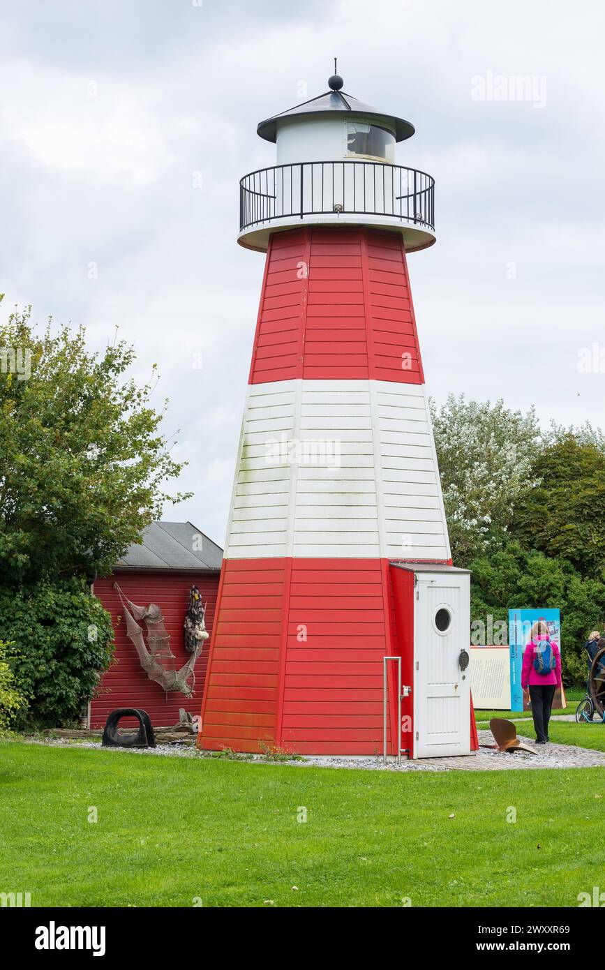 A red and white lighthouse, miniature lighthouse in the museum ...