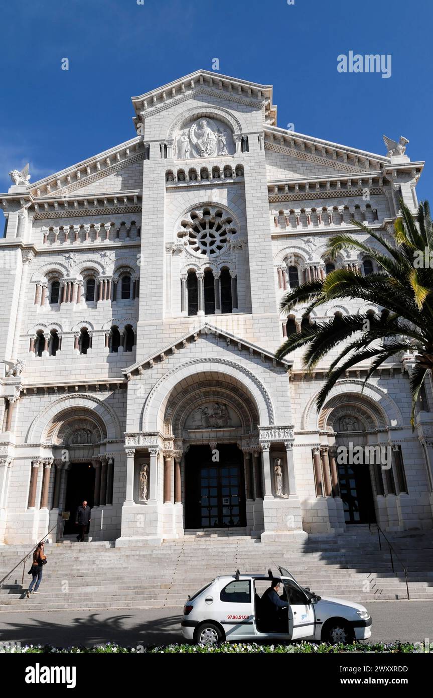 Cathedral, Monte Carlo, Principality of Monaco, front view of a church building with palm trees ...