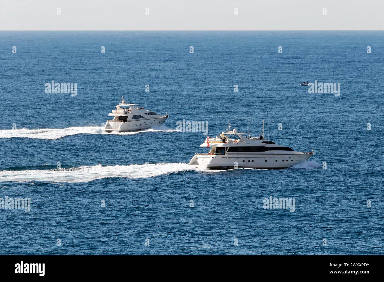 Yachts cruising off Monte Carlo, Principality of Monaco, Two yachts ...