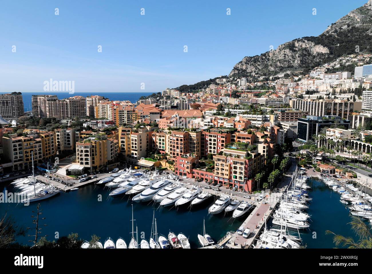 Panoramic view over a marina with boats surrounded by urban development ...