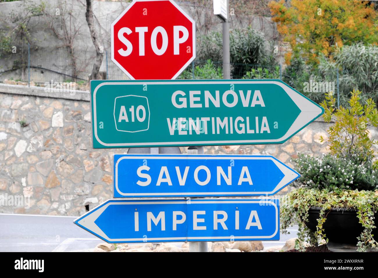 Road signs with directions to various Italian towns, Diana Marina ...