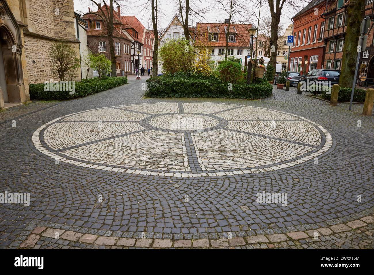 Rosette of white cobblestones at St Laurentius Church with historic ...