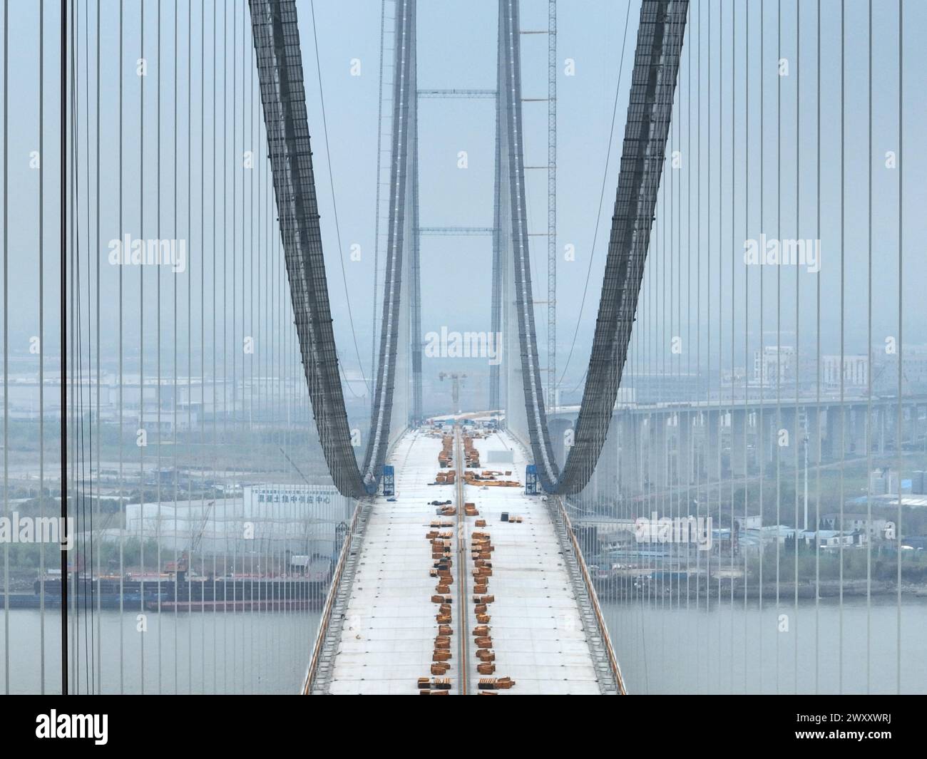 Aerial photo shows the Longtan Yangtze River Bridge under construction ...
