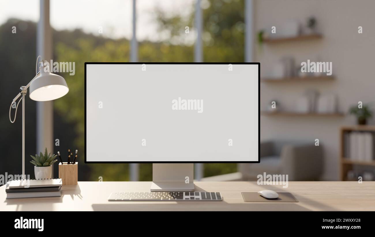 A white-screen PC computer mockup and accessories on a minimalist wooden table in a Scandinavian ...