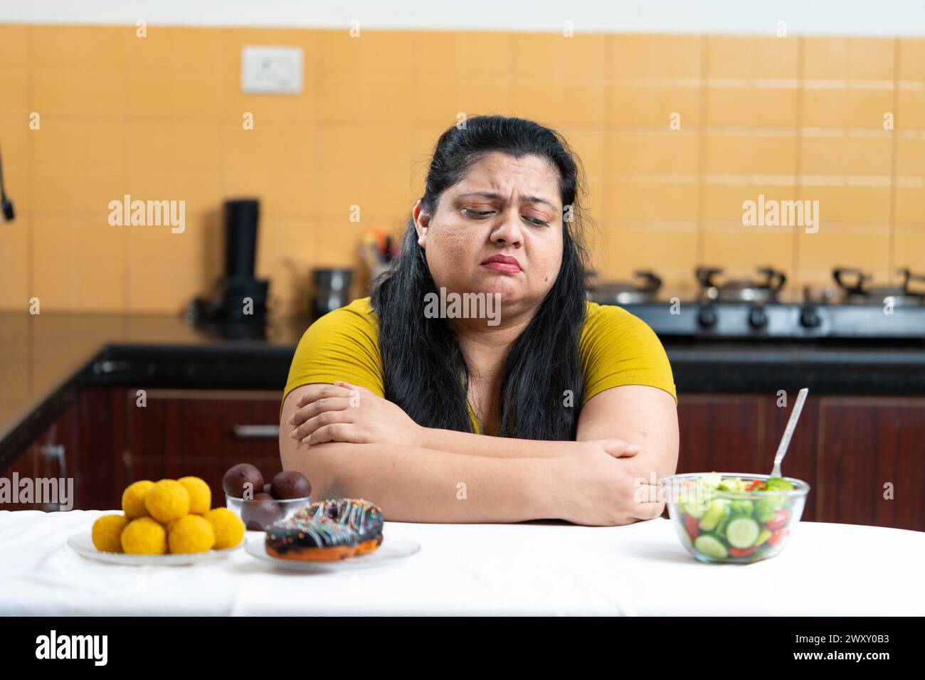 Sad Overweight fat indian woman confused which to choose between ...