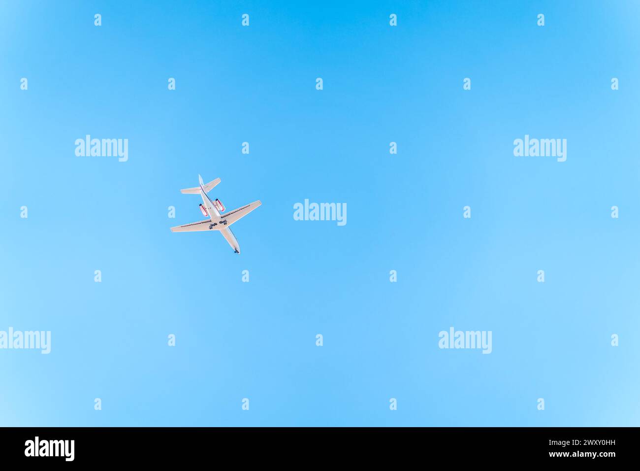 Airplane Cessna 680 before landing in blue sky. Airplane type Cessna ...