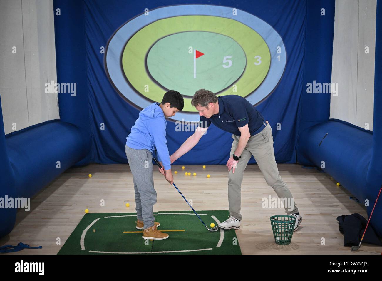 Paris, France. 02nd Apr, 2024. Illustration of a teenager learning golf ...