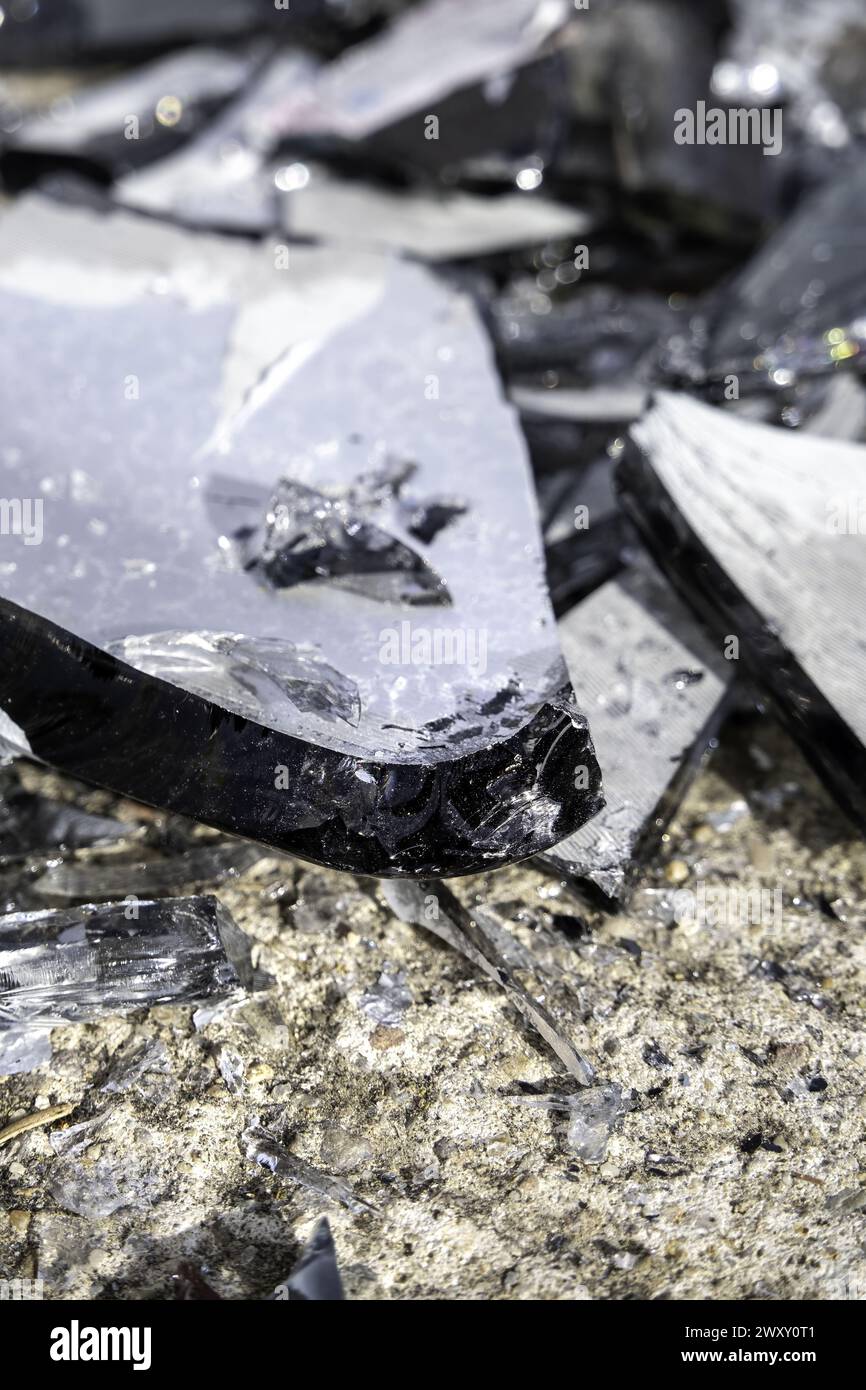 Detail of broken glass thrown in the trash, crime Stock Photo - Alamy