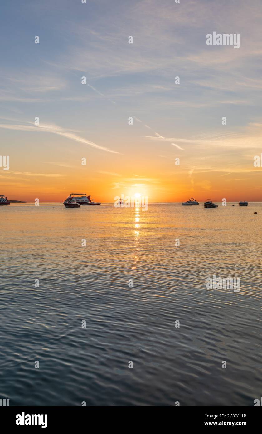 Sunrise over the sea. Panoramic seascape. Burning sky and shining ...