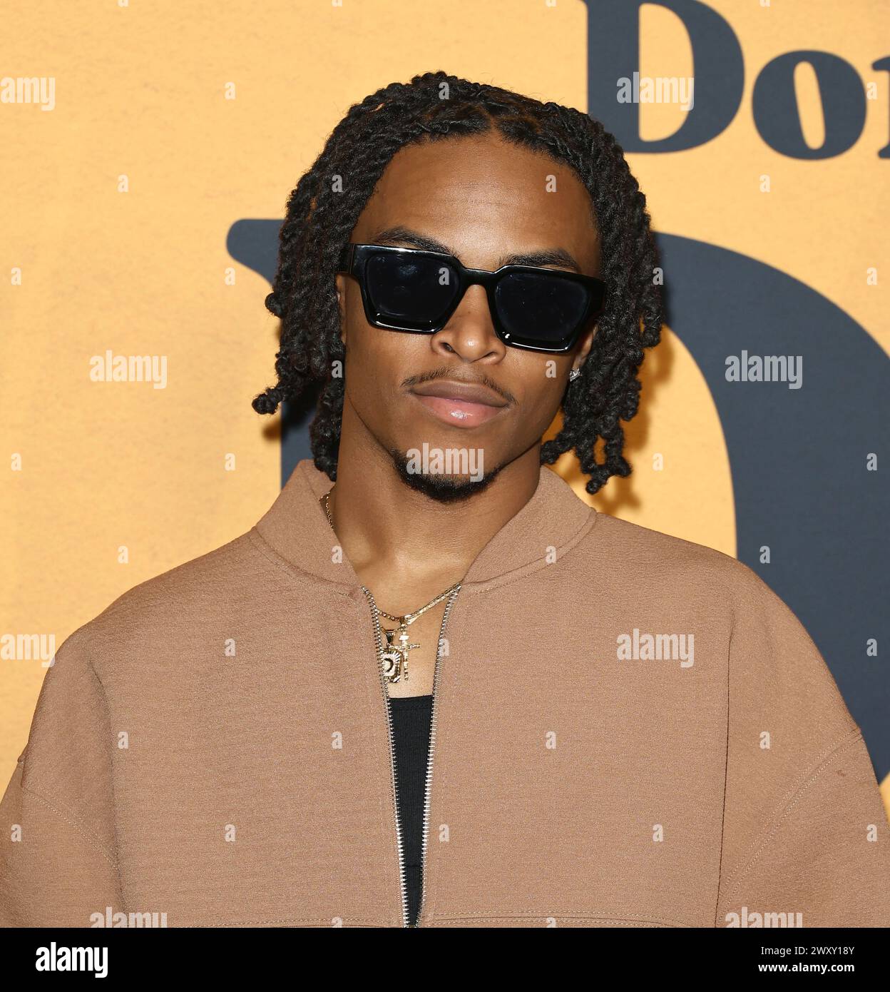 Danielle T. Hansley Jr arrives at Don't Tell Mom The Babysitters Dead ...