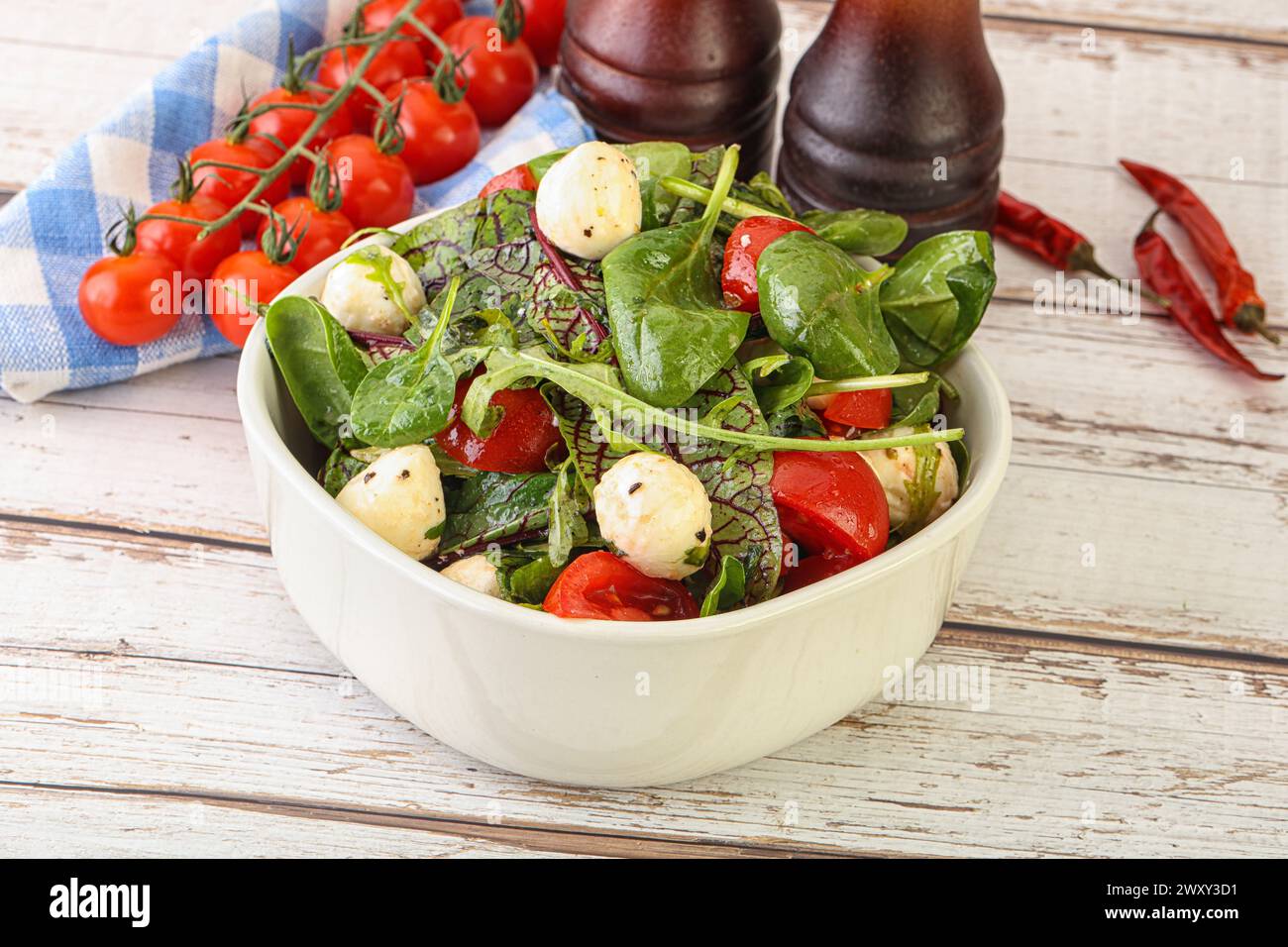 Mix salad with mini mozzarella and tomato Stock Photo - Alamy