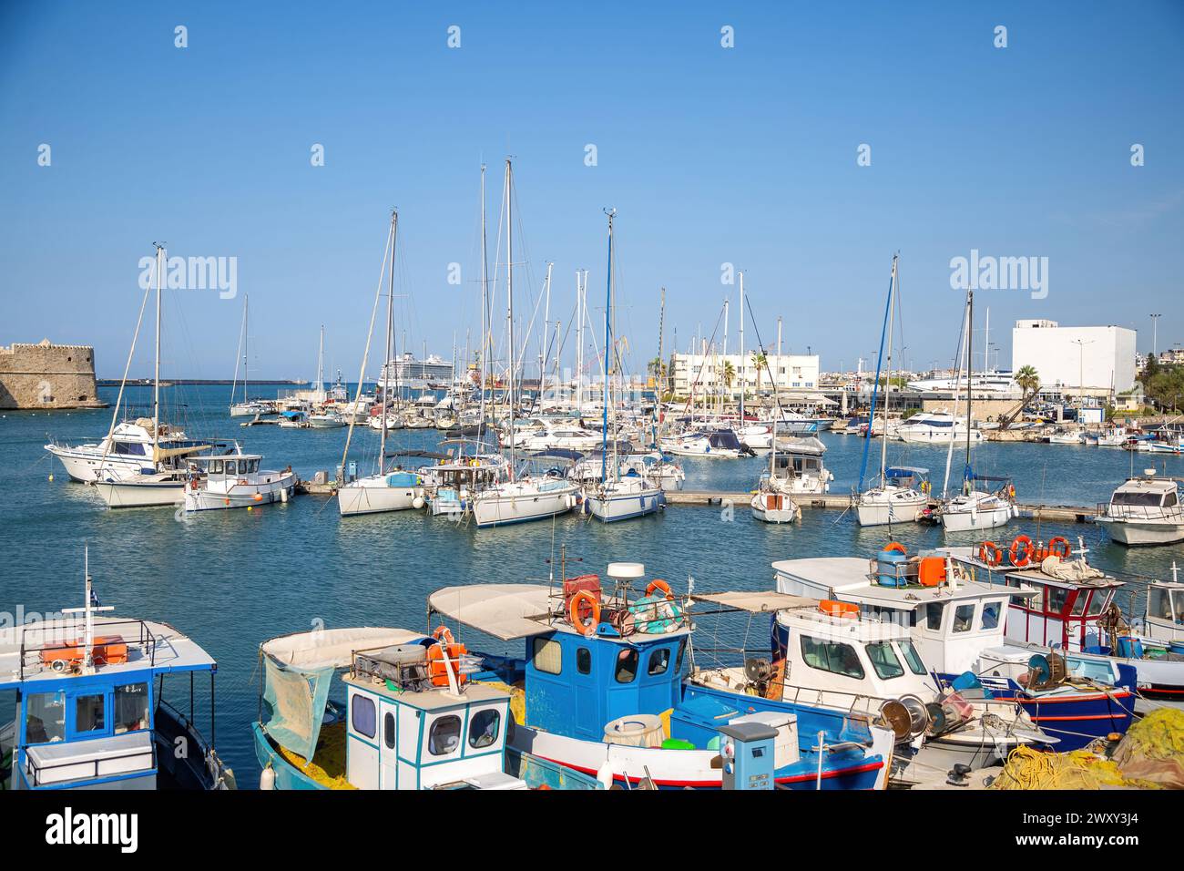 Crete island, destination Greece. Moored vessel with mast and fishing ...