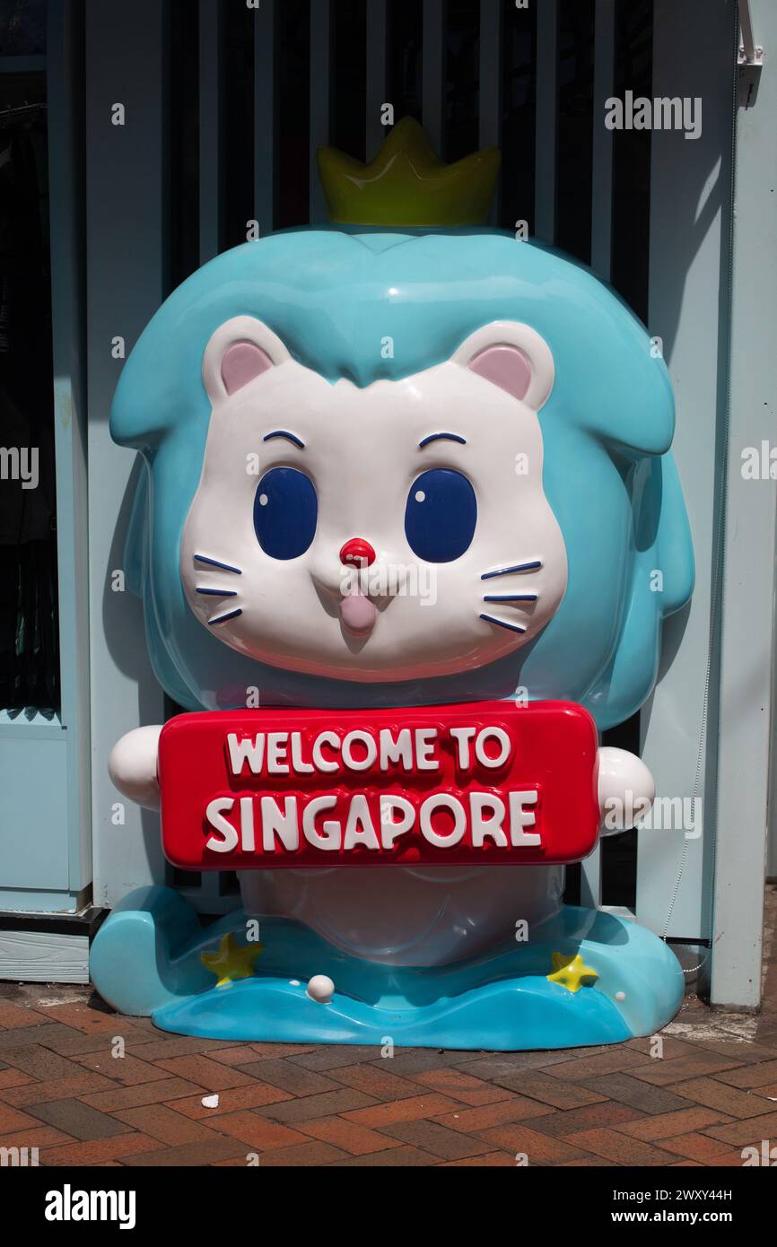3 April 2024. Cute Merlion display at Chinatown. Holding a red sign ...