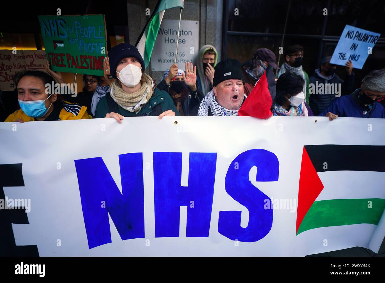 NHS staff blockade the entrance to NHS England's headquarters in ...