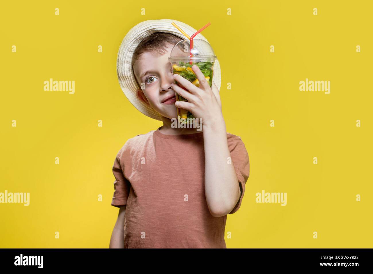 Boy drinking from plastic cup hi-res stock photography and images - Alamy