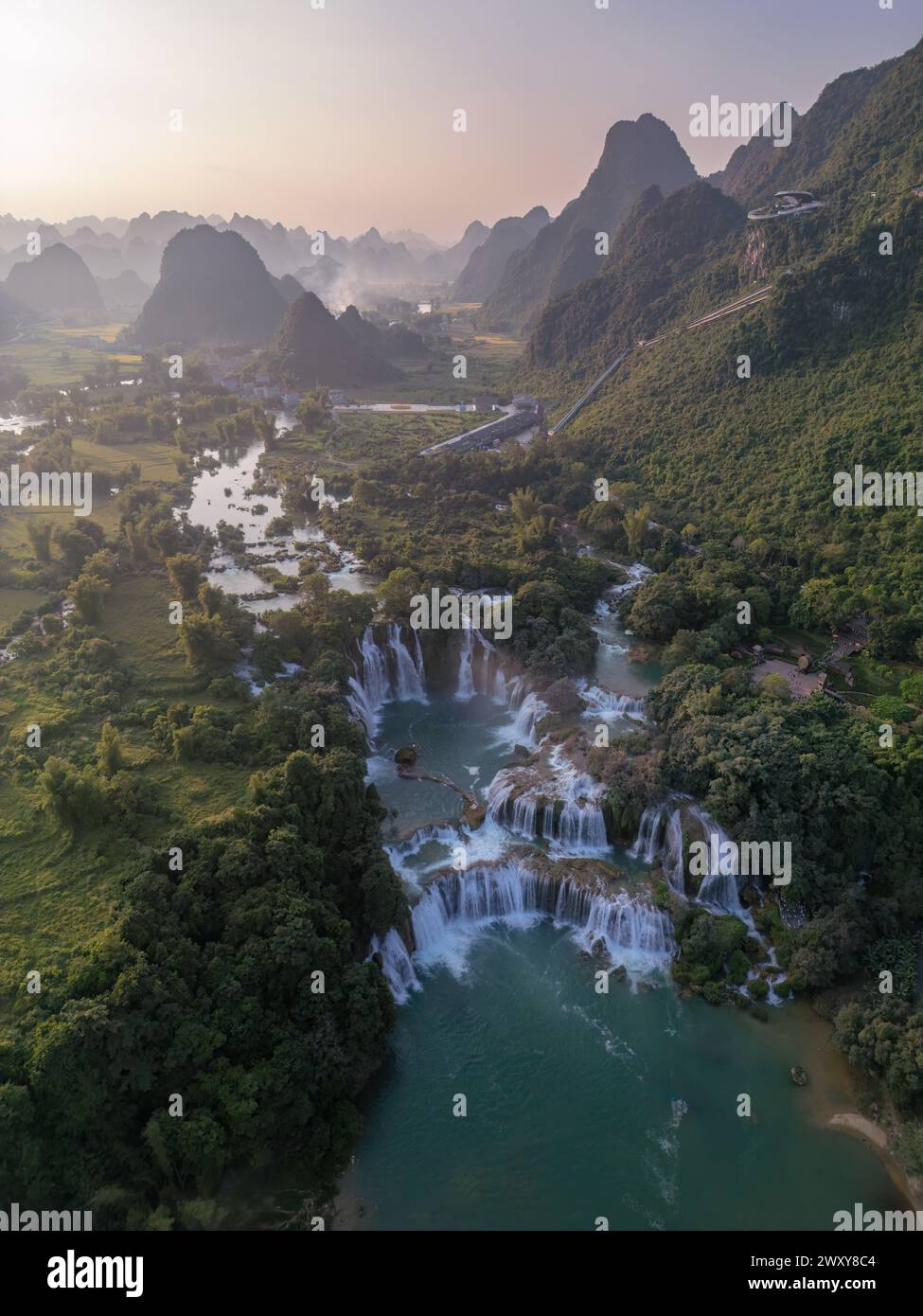 A vertical aerial view of the scenic Ban Gioc Waterfalls in Vietnam ...