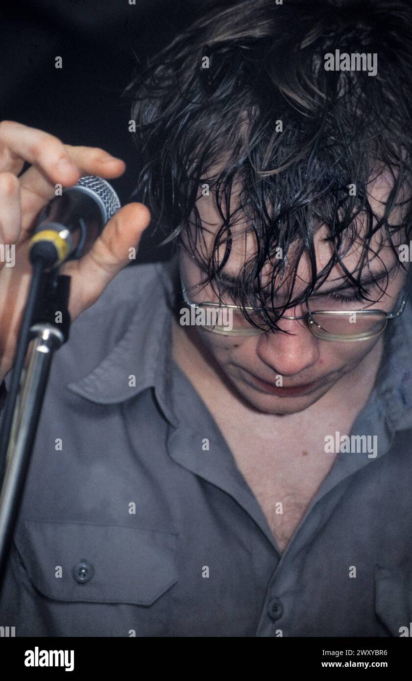 GOMEZ, EARLY CONCERT, 1998: A young Ben Ottewell of Gomez playing a ...