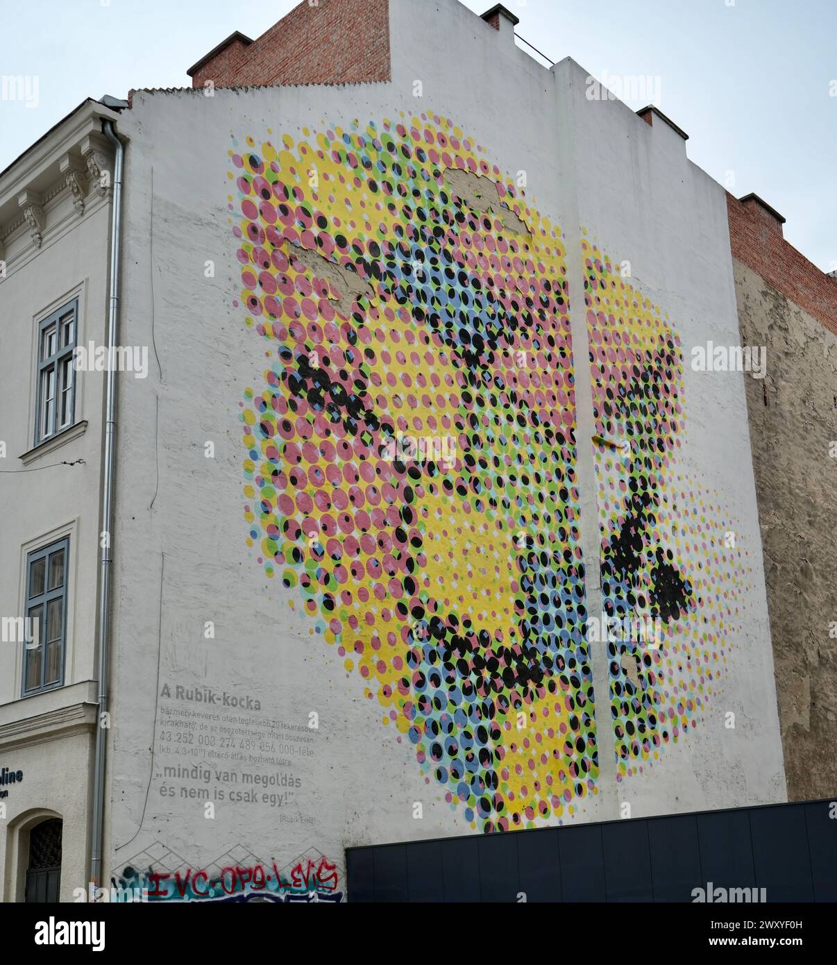 Colourful Rubiks Cube street art mural on the side of a house Stock ...