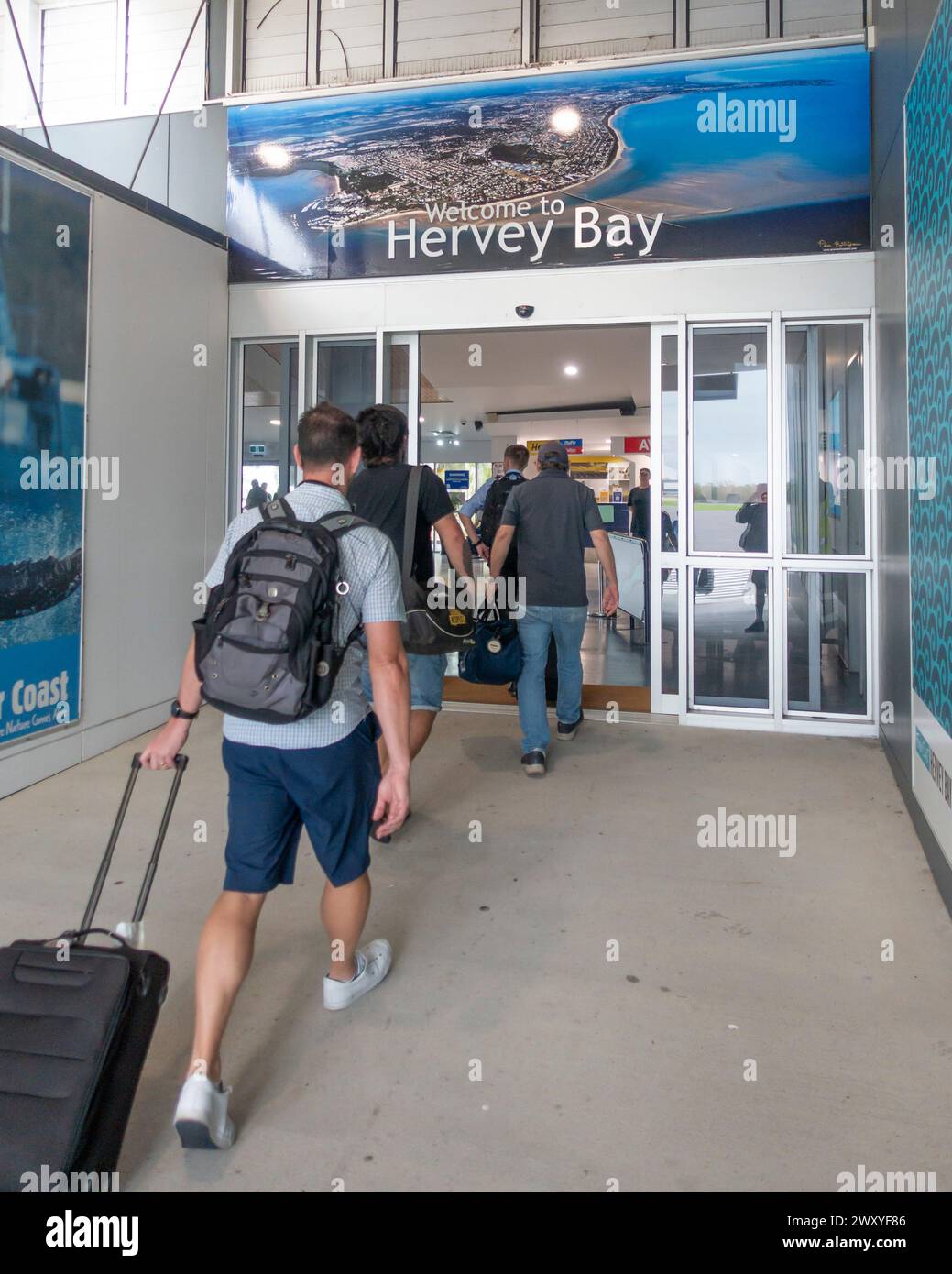 Passengers enter the arrival hall at Hervey Bay airport, Queensland ...