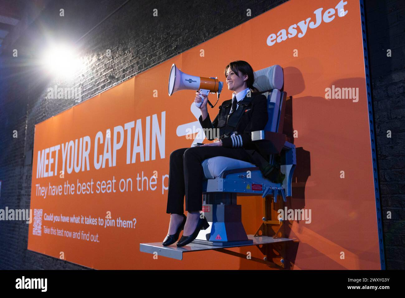 EDITORIAL USE ONLY Sarah Ackerley, easyJet pilot, sits on an ...