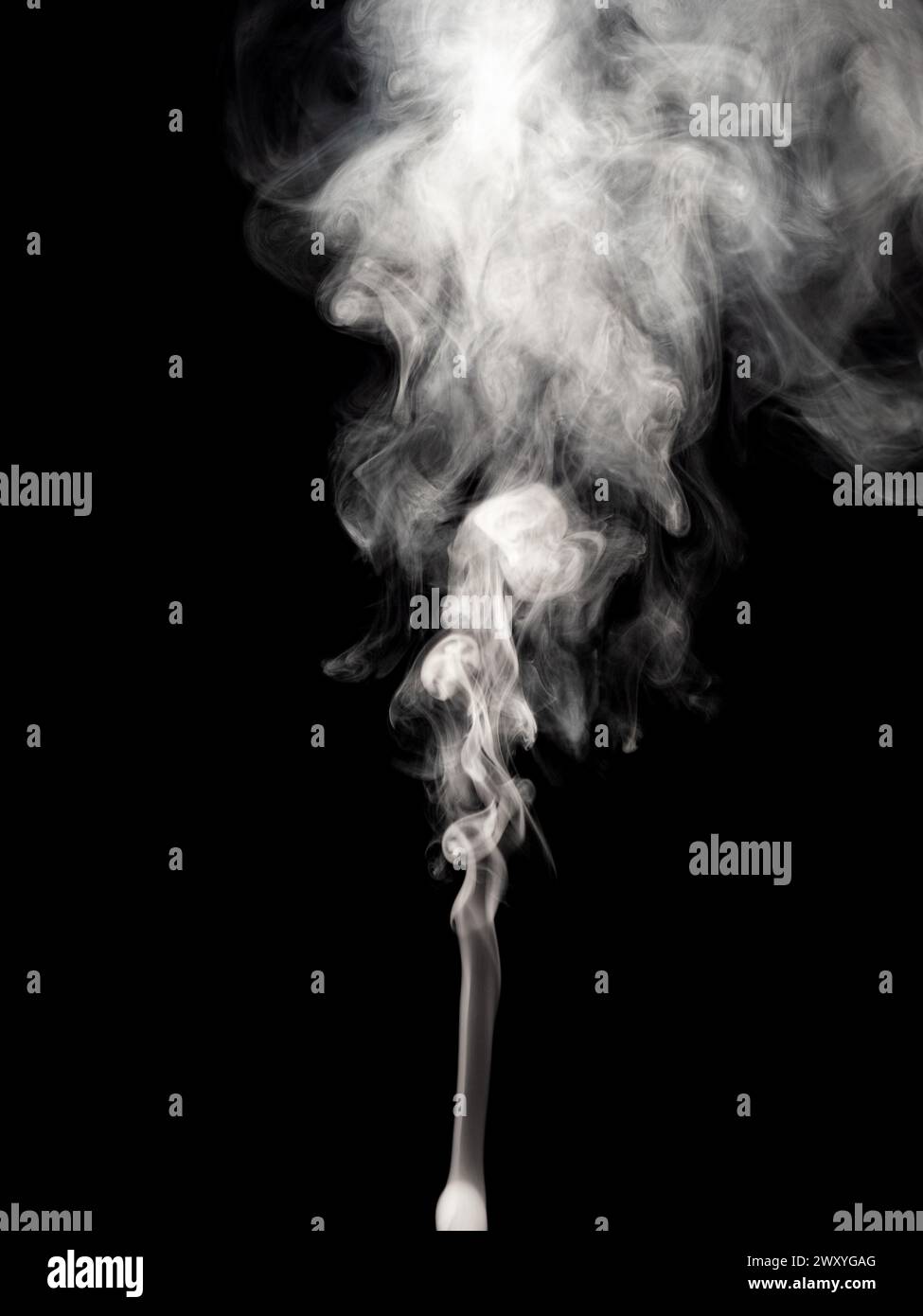 White smoke jet isolated on a black background, rising tubers upwards ...