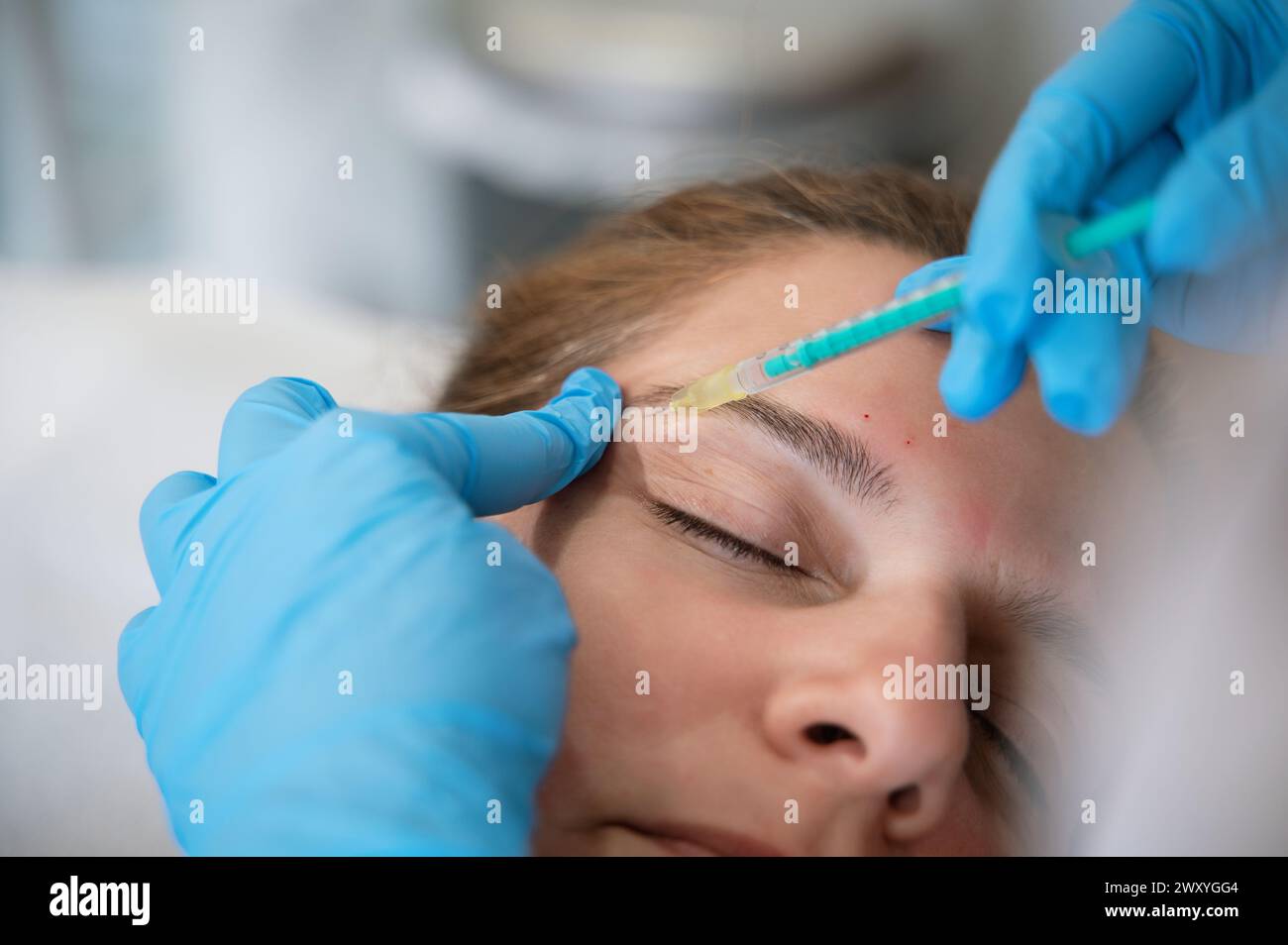 Female patient receiving injection from hi-res stock photography and ...