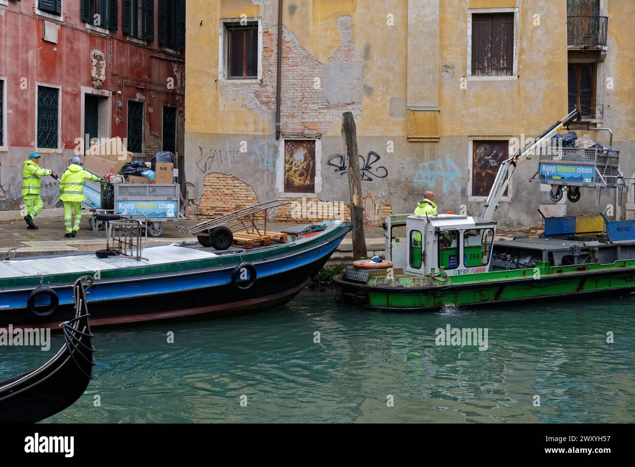 Italy, Venice: garbage canal boat Stock Photo - Alamy