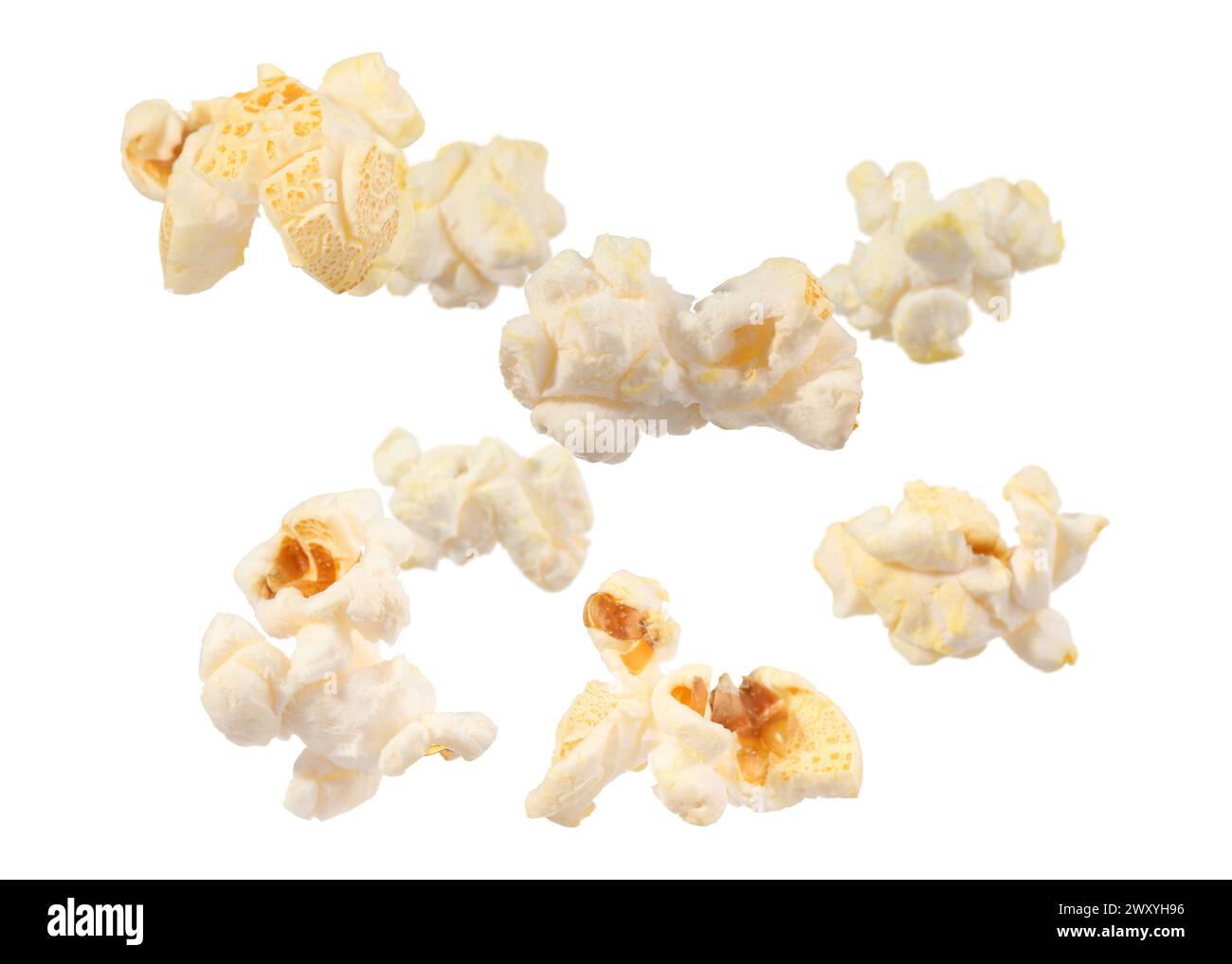 Tasty fresh popcorn flying on white background Stock Photo - Alamy