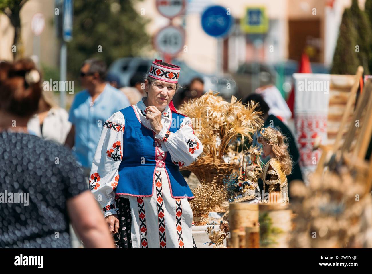 Elderly Female Weaver In Traditional Embroidered Belarusian Clothes ...