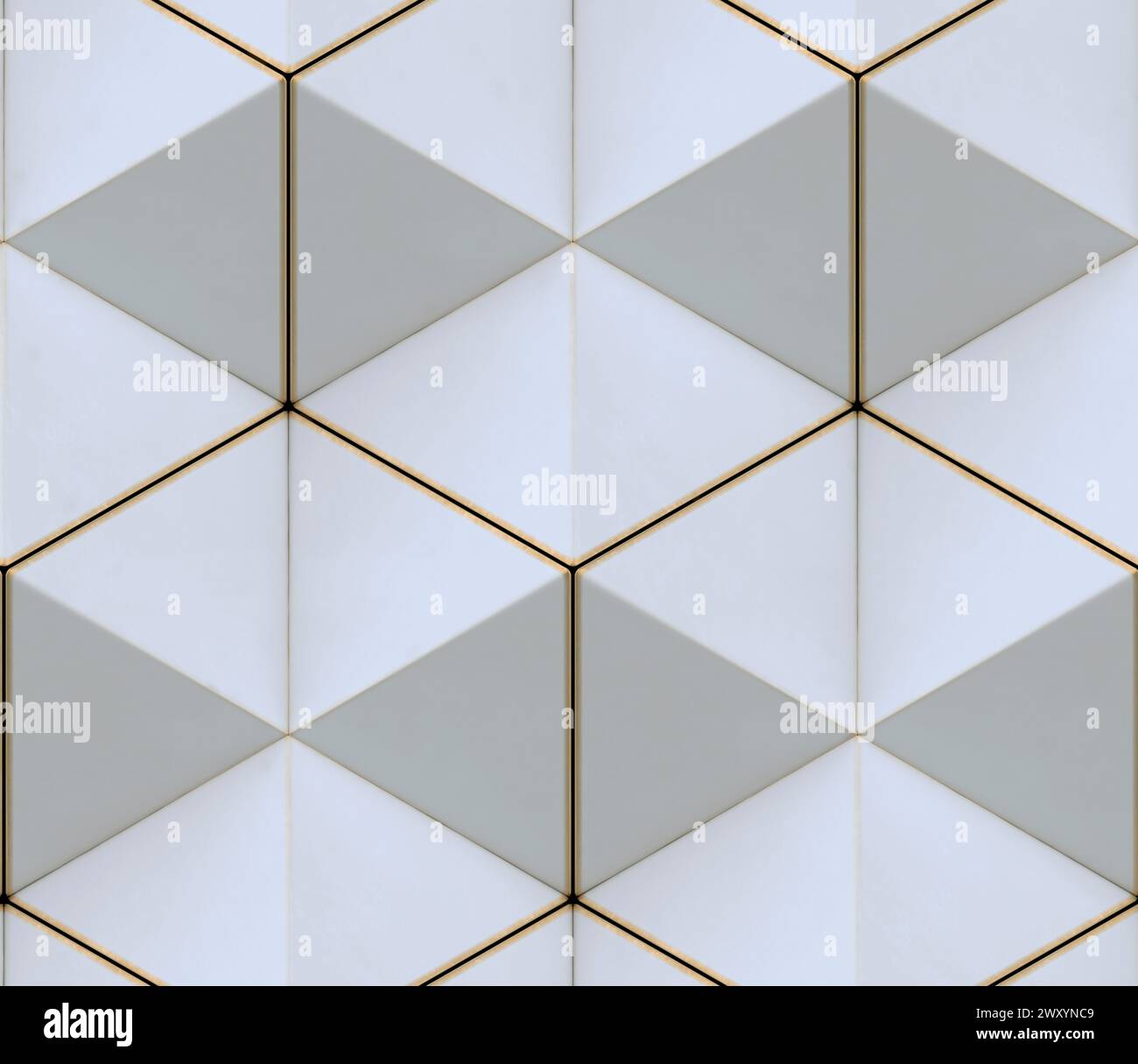 3D wall of white triangles with gold edges in the loft style assembled ...
