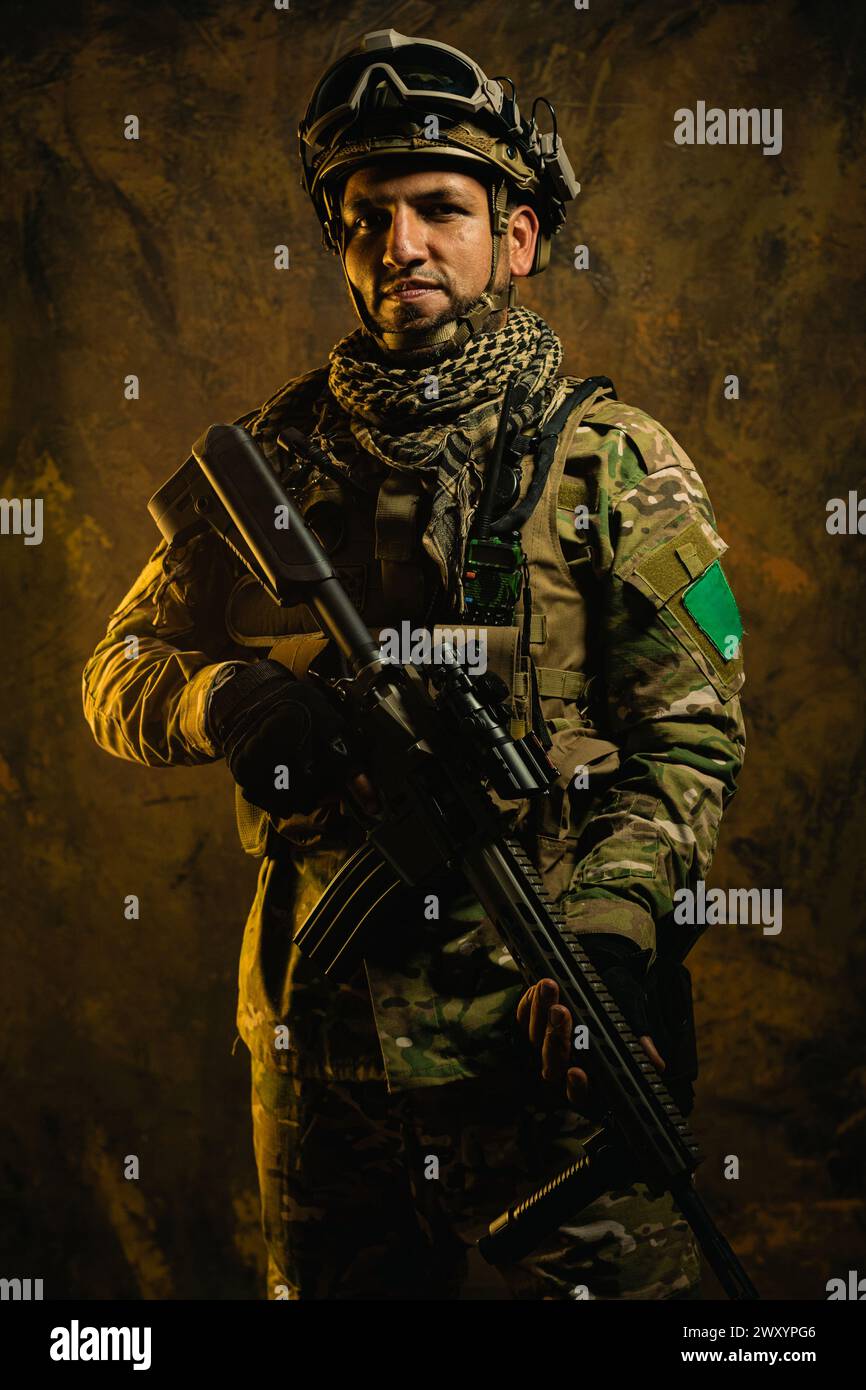 A portrait of a resolute Latin American soldier in full gear, posing ...
