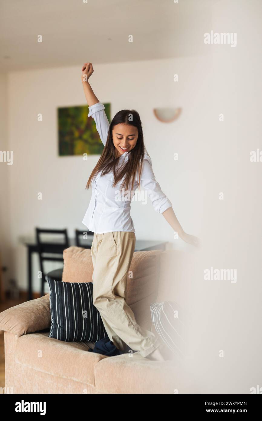 Woman dancing by herself at home hi-res stock photography and images ...