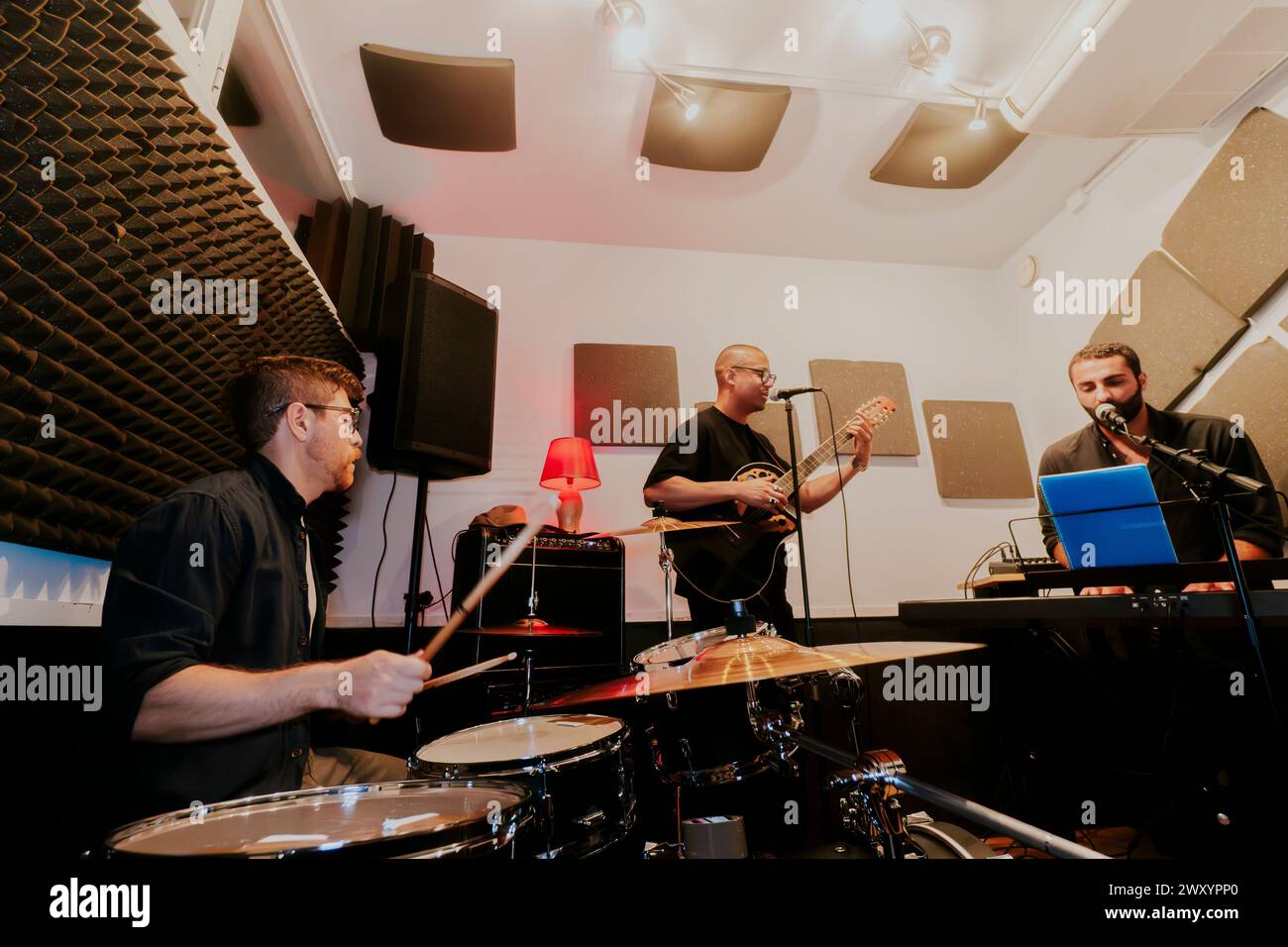 Male guitarist recording song home hi-res stock photography and images ...