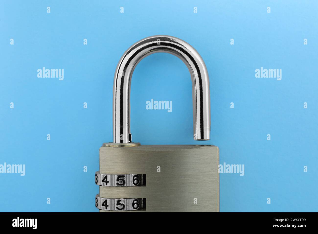 Steel combination padlock on light blue background, top view Stock ...