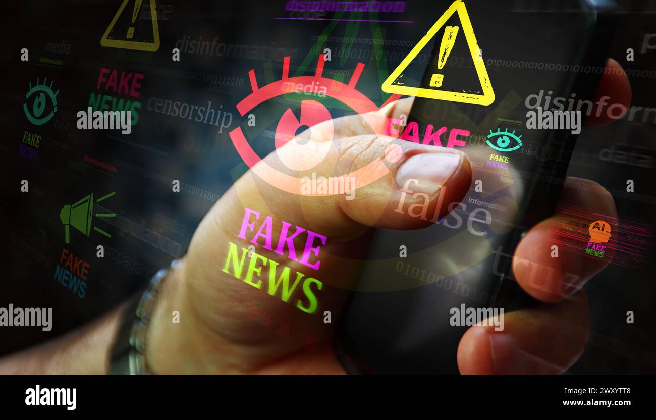 Fake news hoax and disinformation symbol mobile technology concept ...