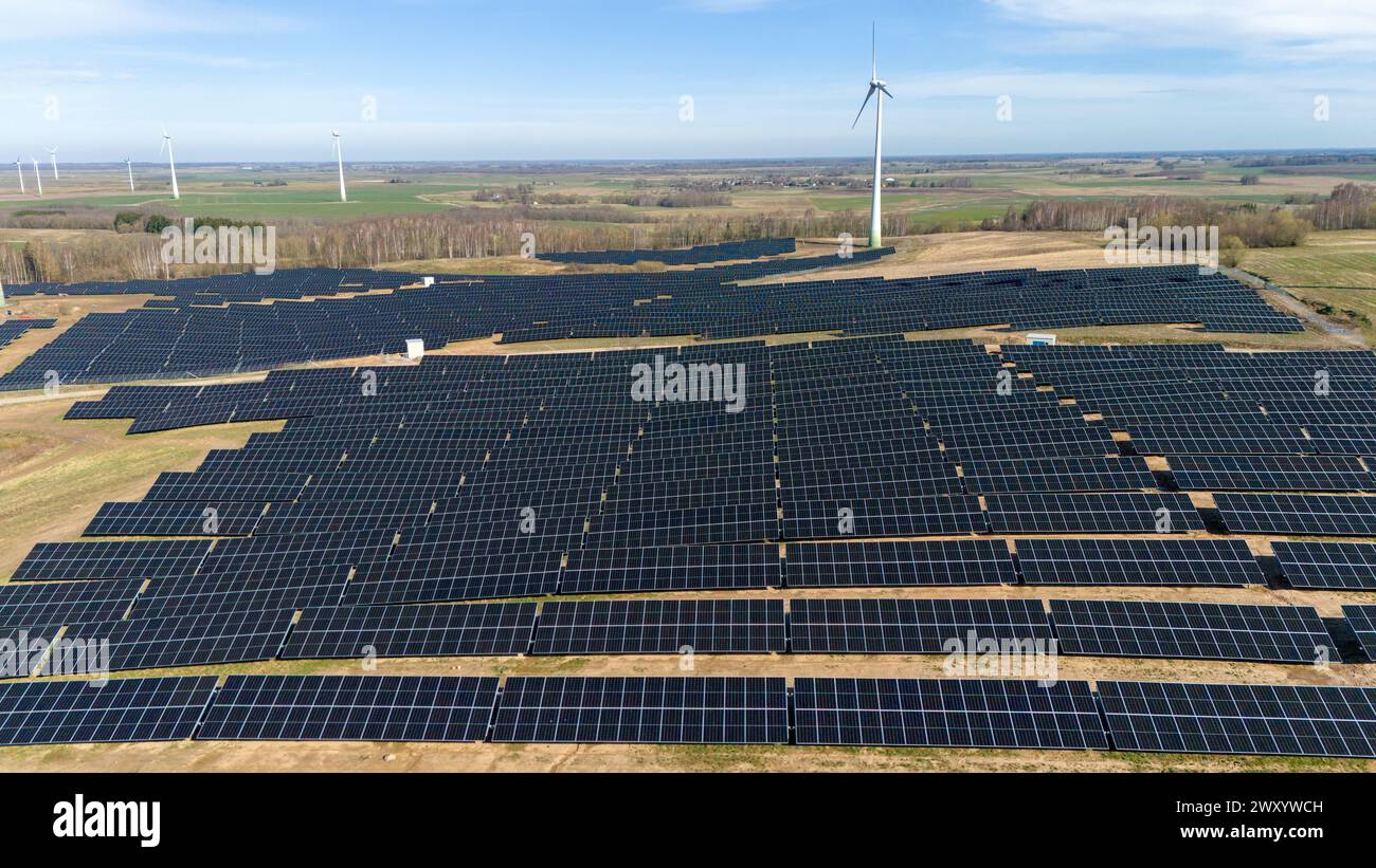 The Wind turbines and Electrum solar park in Taurage, Lithuania Stock ...