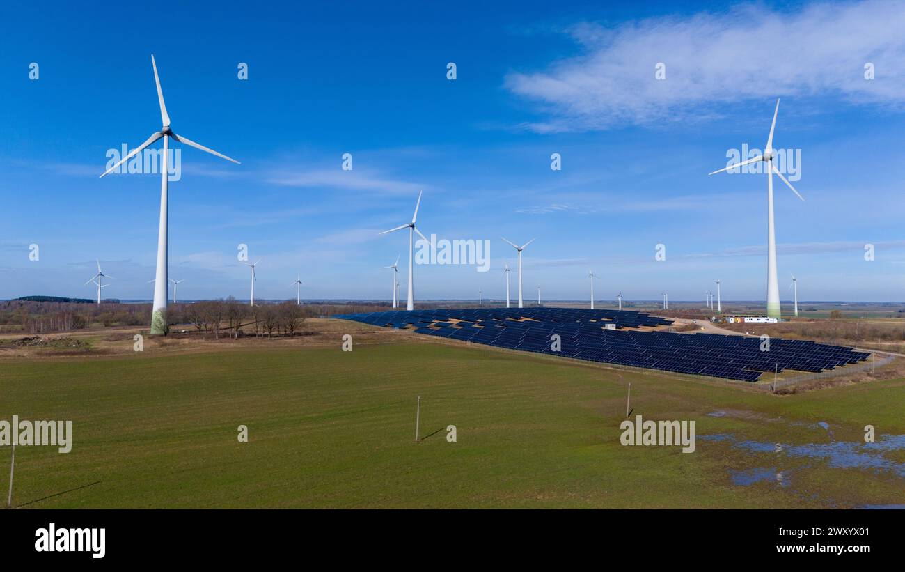 The Wind turbines and Electrum solar park in Taurage, Lithuania Stock ...