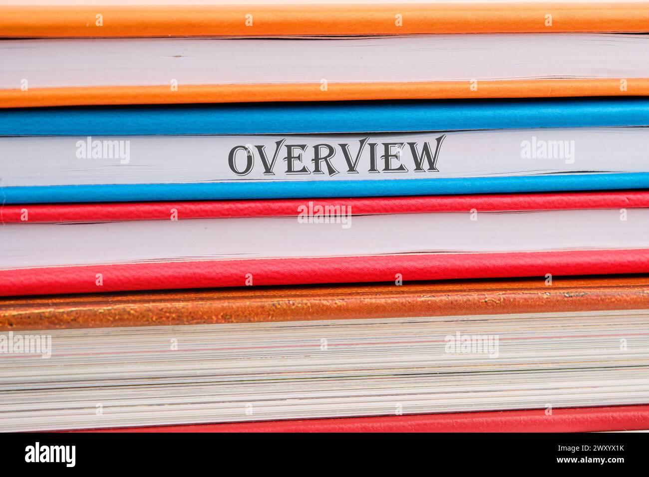 OVERVIEW written on notebooks stacked in a pile Stock Photo - Alamy
