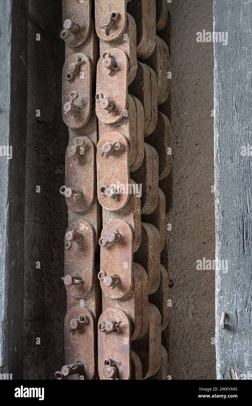 Detail of the old and robust iron chain to lift the medieval castle ...