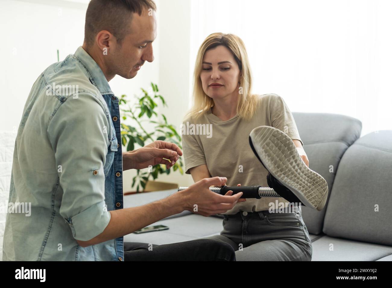 Technician testing robotic bionic leg at prosthetic manufacturing Stock ...