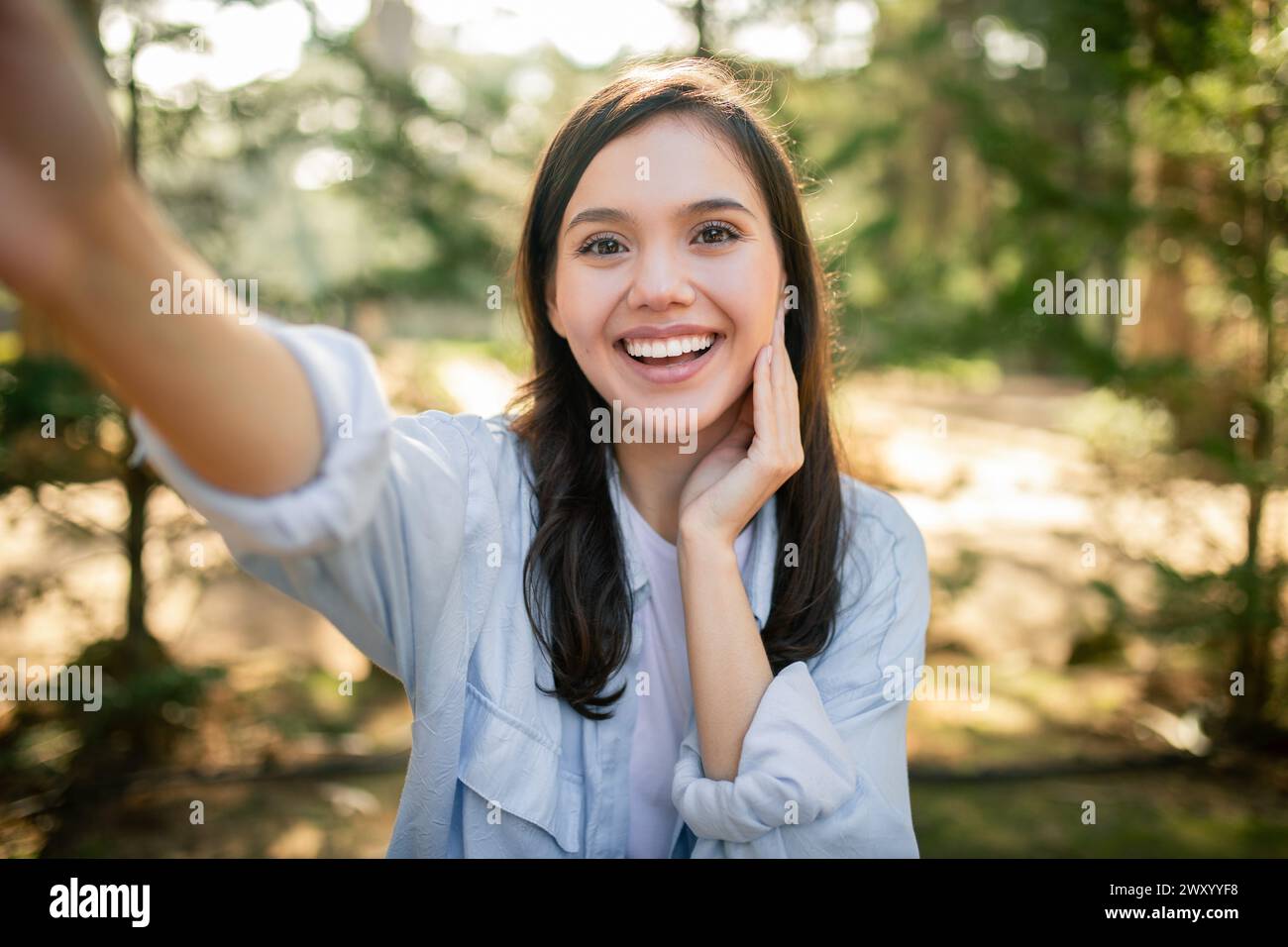 Radiant young woman taking hi-res stock photography and images - Alamy