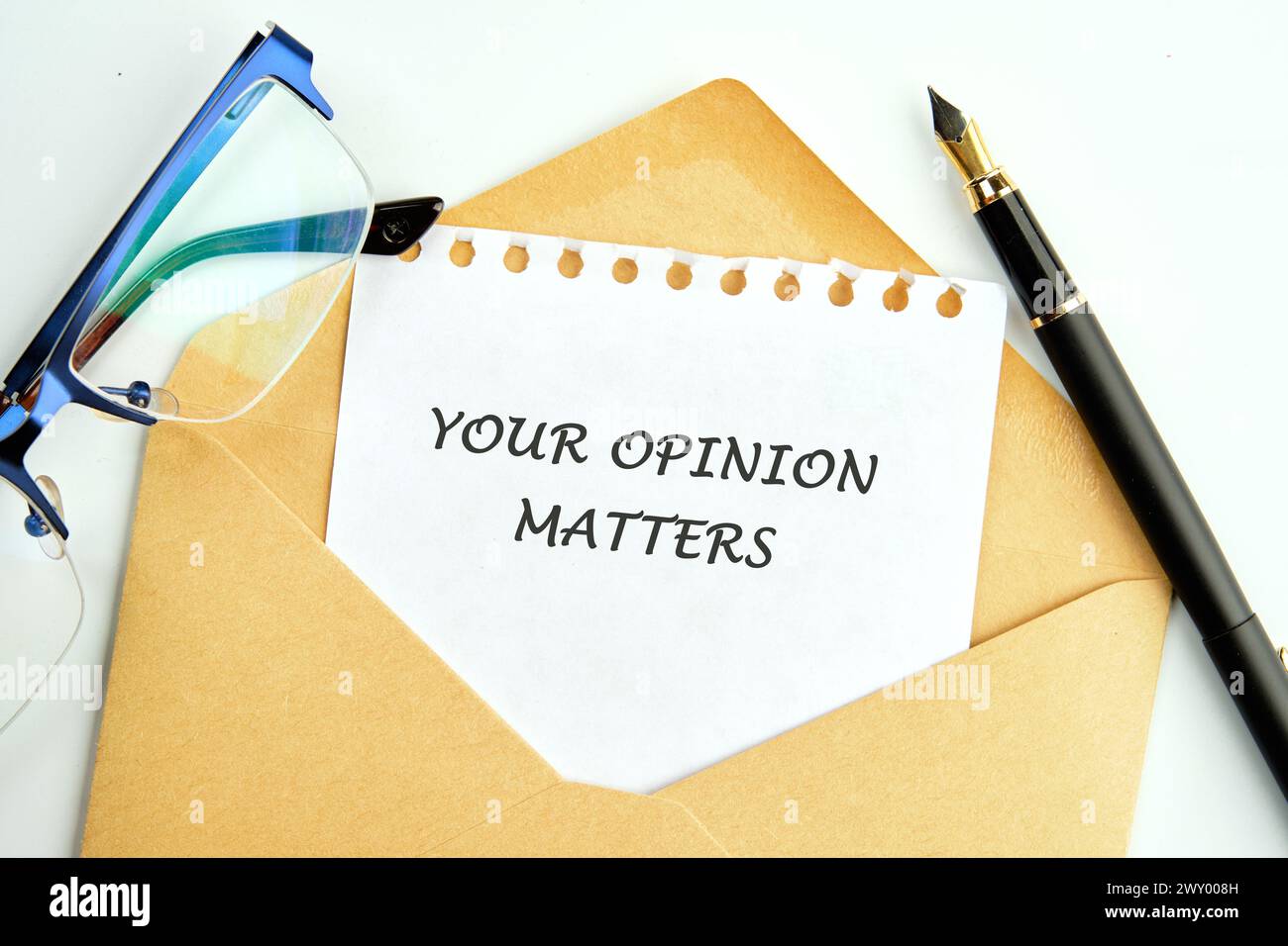YOUR OPINION MATTERS phrase written on a sheet in an envelope Stock ...