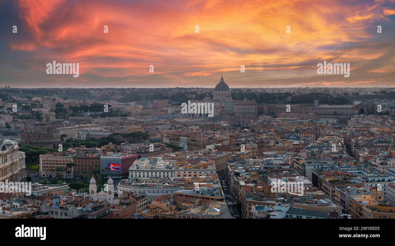 An aerial view of Rome at dusk reveals a sky changing from pink to blue ...