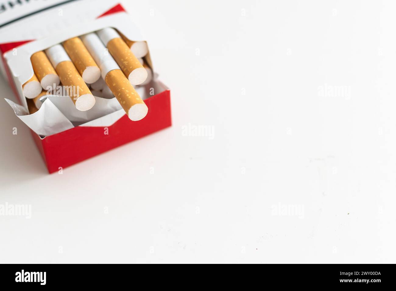 Open blue pack of cigarettes isolated on white background. Box of ...