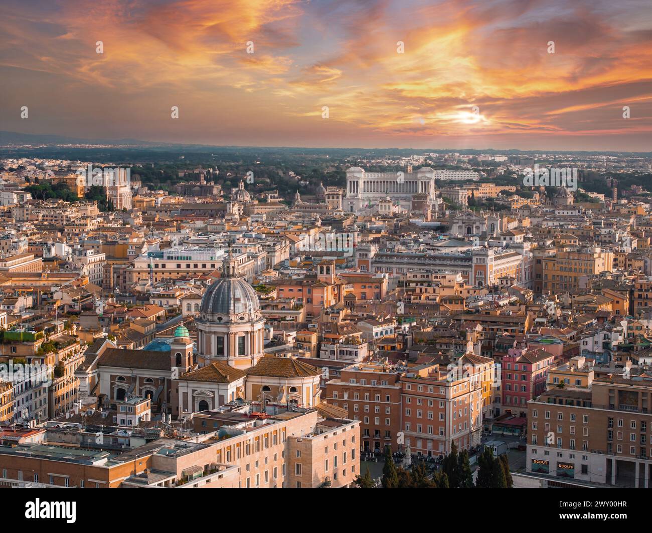 An aerial view of Rome at dusk reveals a sky changing from pink to blue ...